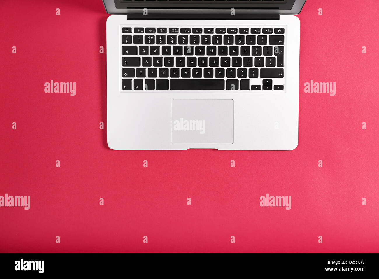 Modern laptop on color background Stock Photo - Alamy