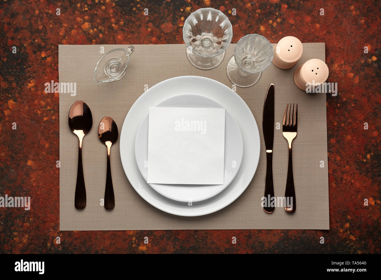 Simple table setting on color background Stock Photo - Alamy