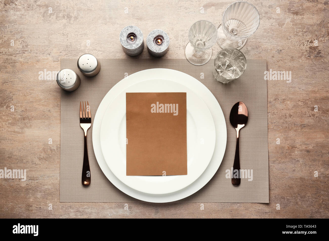 Simple table setting on wooden background Stock Photo - Alamy