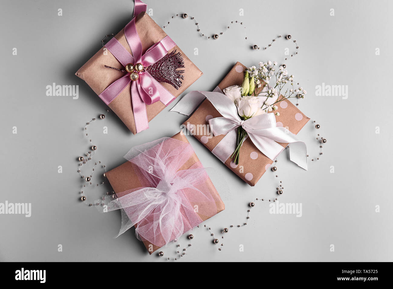 Beautiful gift boxes on light background Stock Photo - Alamy