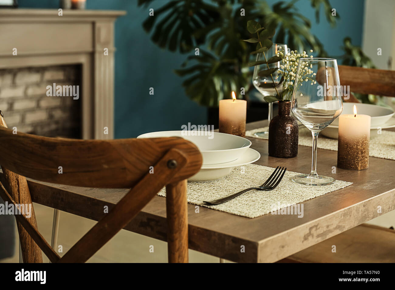 Beautiful table setting in dining room Stock Photo - Alamy