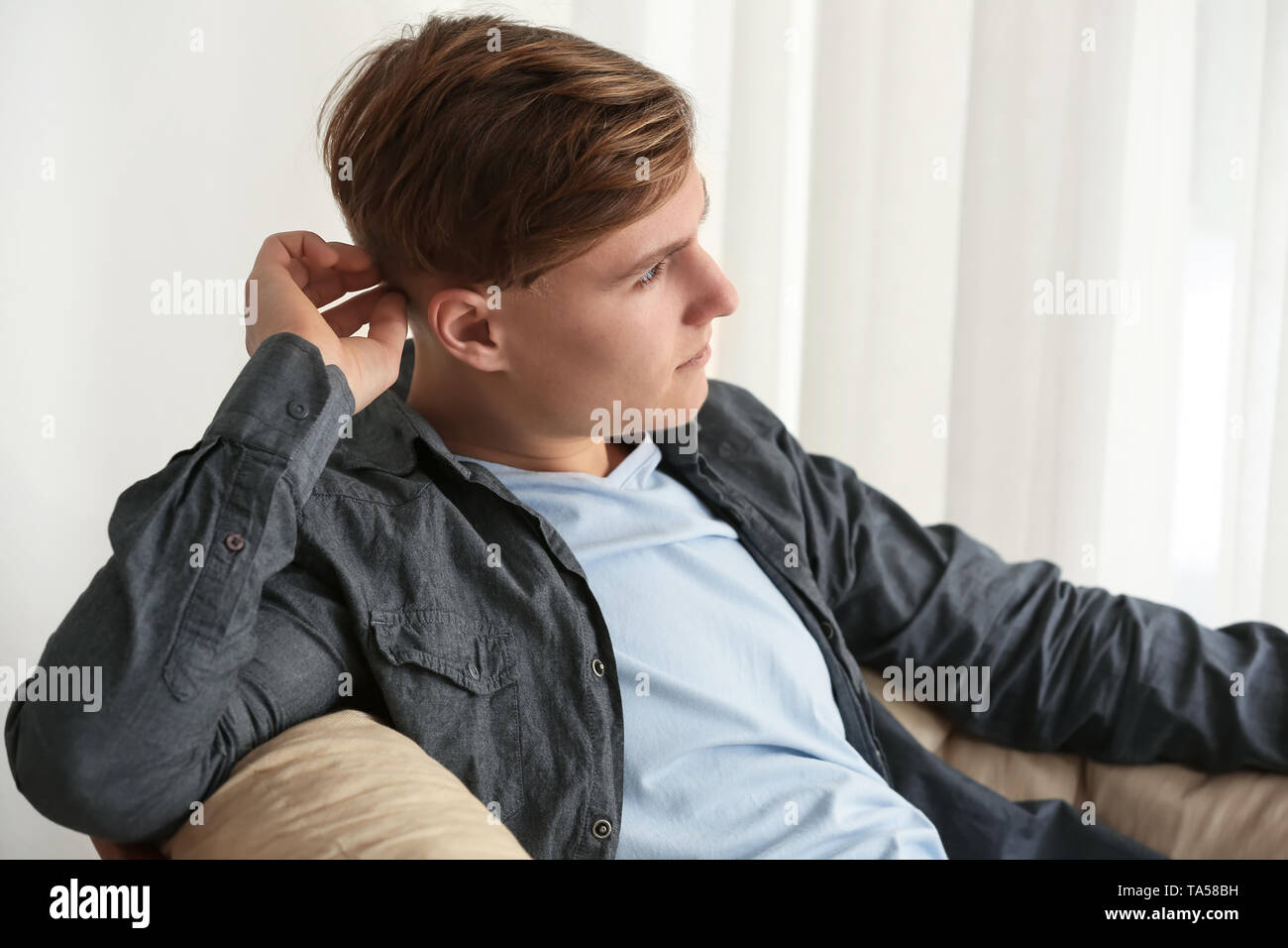 Handsome guy posing relaxing hi-res stock photography and images - Alamy