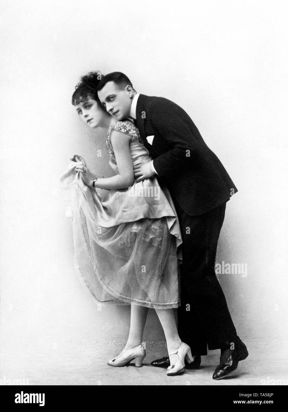 Couple dances with serious gaze, around 1910, Germany Stock Photo - Alamy