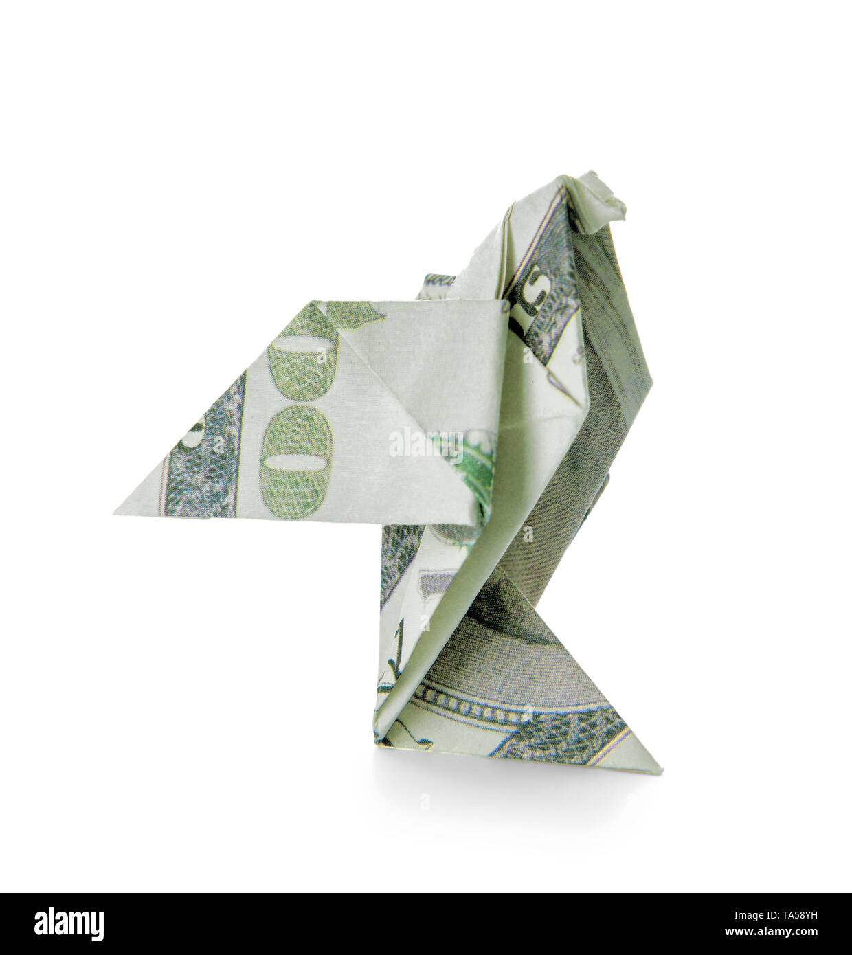 Origami bird made of dollar banknote on white background Stock Photo ...
