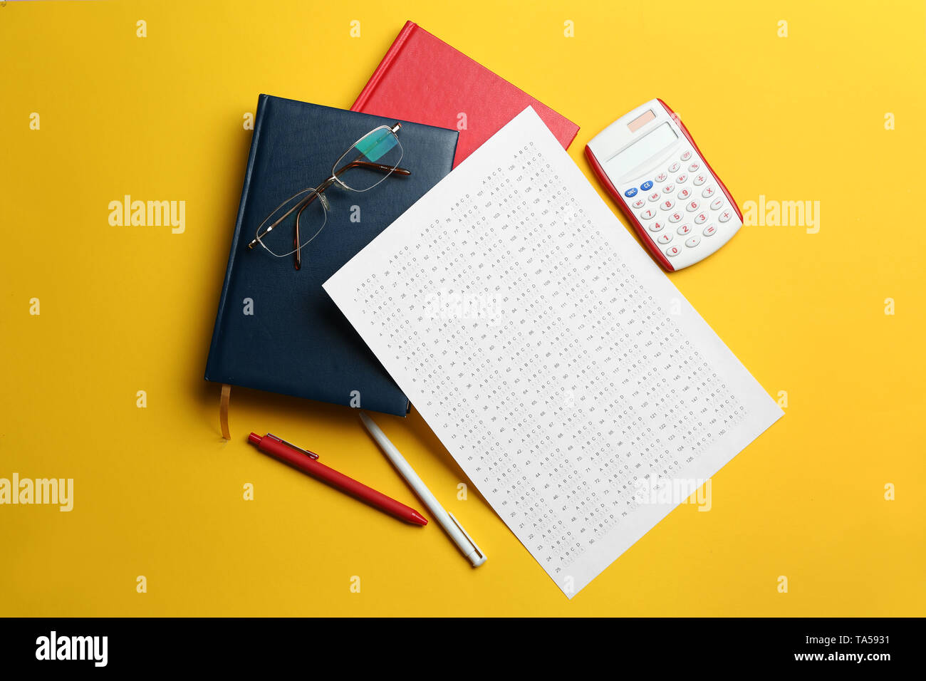 School stationery and answer sheet form on color background. Concept of ...