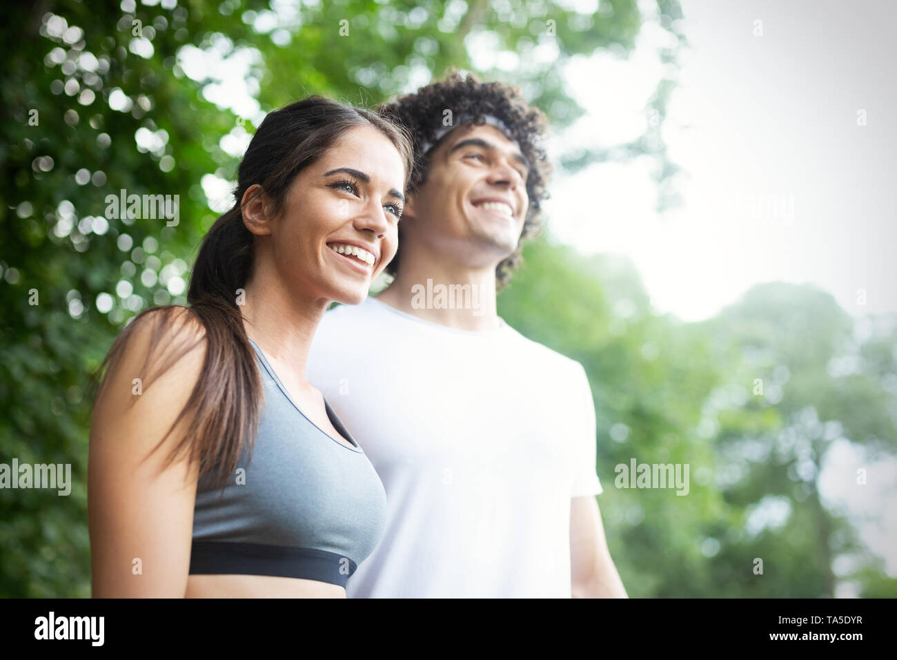 fitness, sport, friendship and lifestyle concept - smiling couple ...