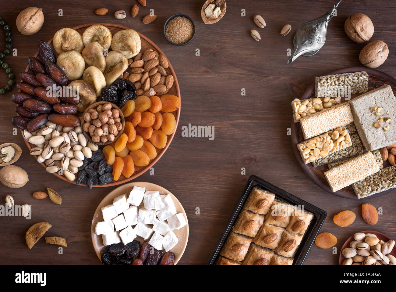 Assortment, set of Eastern, Arabic, Turkish sweets, nuts and dried ...