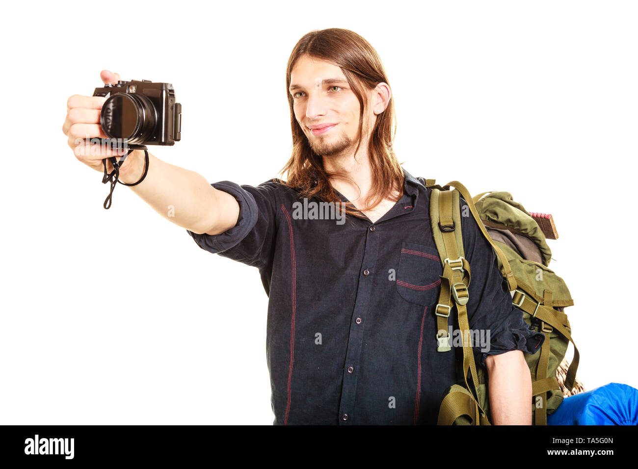 Man tourist backpacker on trip taking photo picture with camera. Young ...