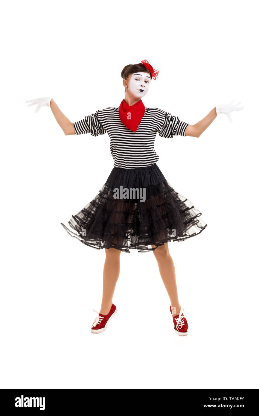 Full length portrait of mime woman artist jumping isolated on white ...