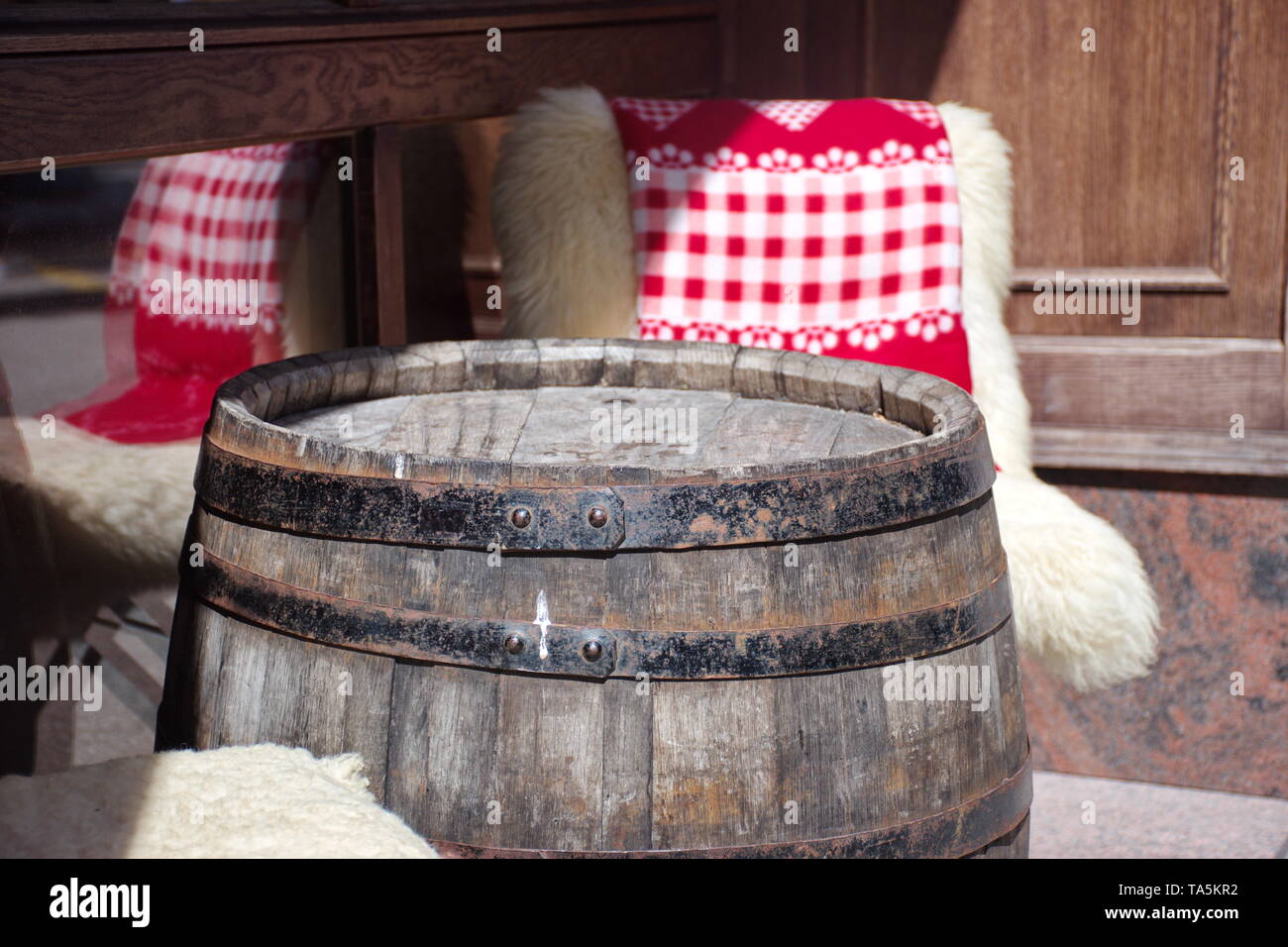 Rustic barrel used as a table Stock Photo - Alamy