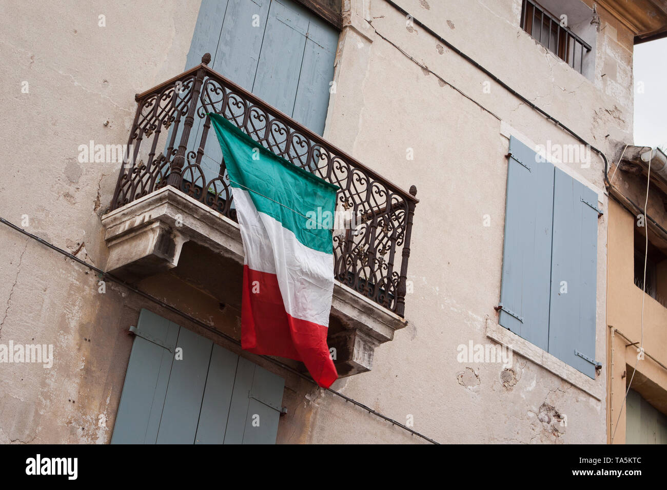 An Italian flag hanging from a balcony in Bassano Del Grappa, Italy ...
