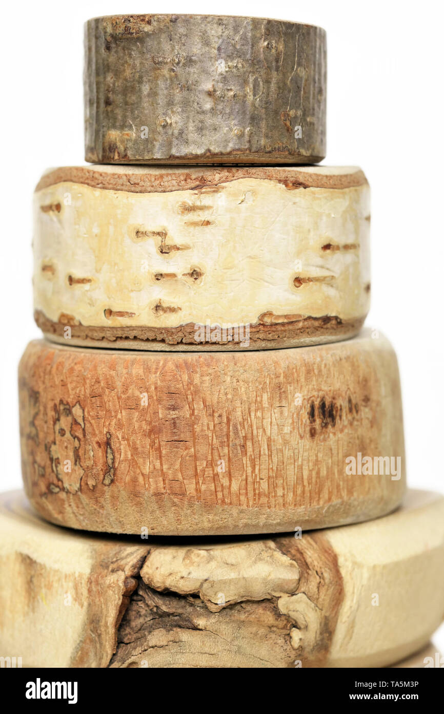 A wooden pyramid of treated wood on a white background close-up Stock ...