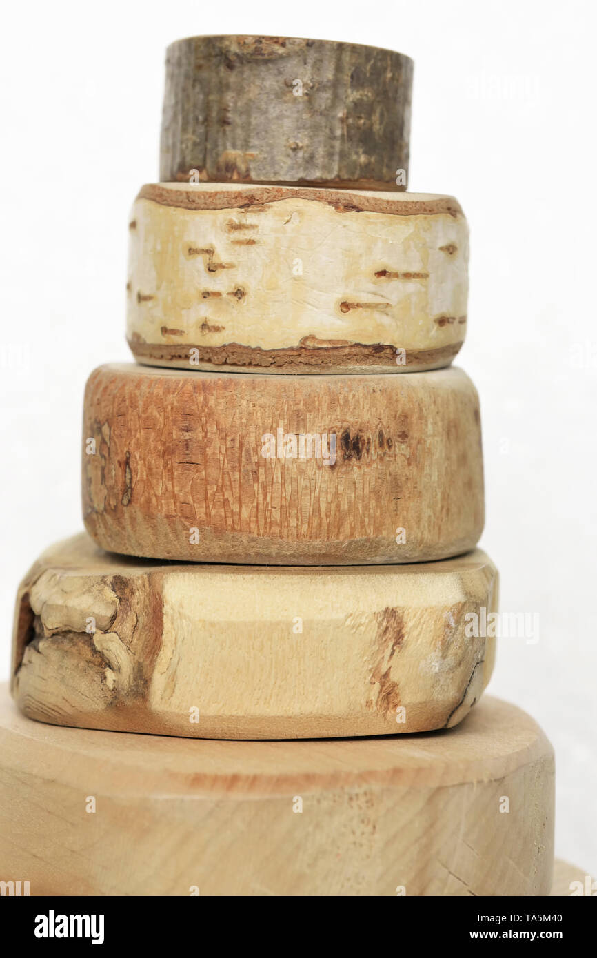 A wooden pyramid of treated wood on a white background close-up Stock ...