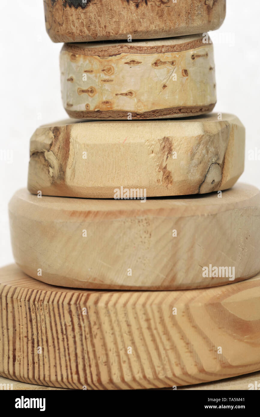 A wooden pyramid of treated wood on a white background close-up Stock ...