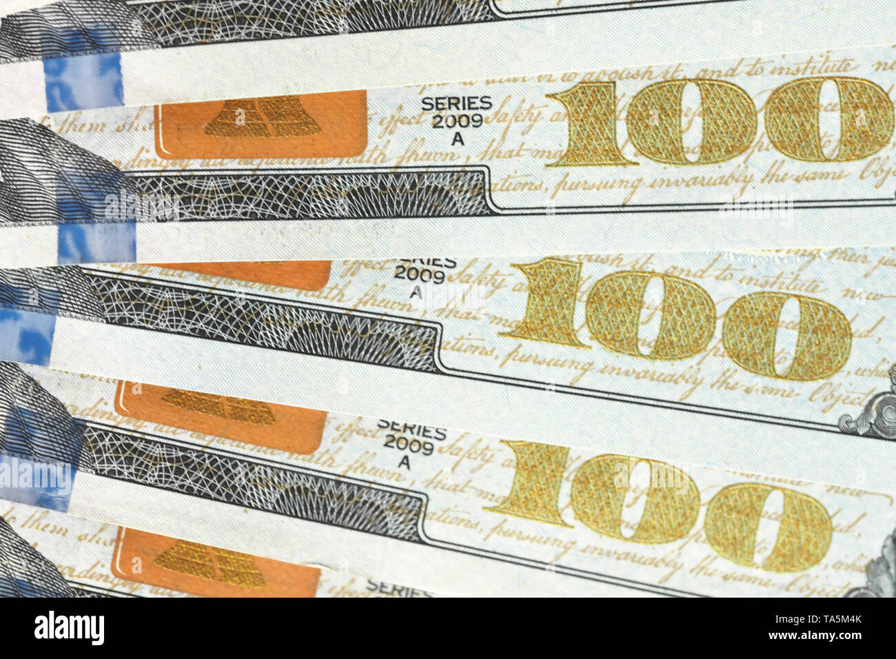 US paper banknotes in denominations of one hundred US dollars close-up ...