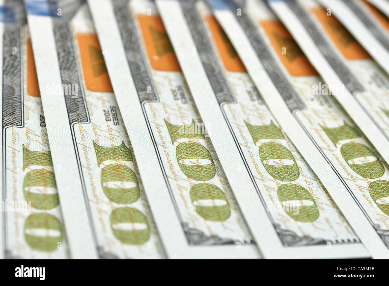 US paper banknotes in denominations of one hundred US dollars close-up ...
