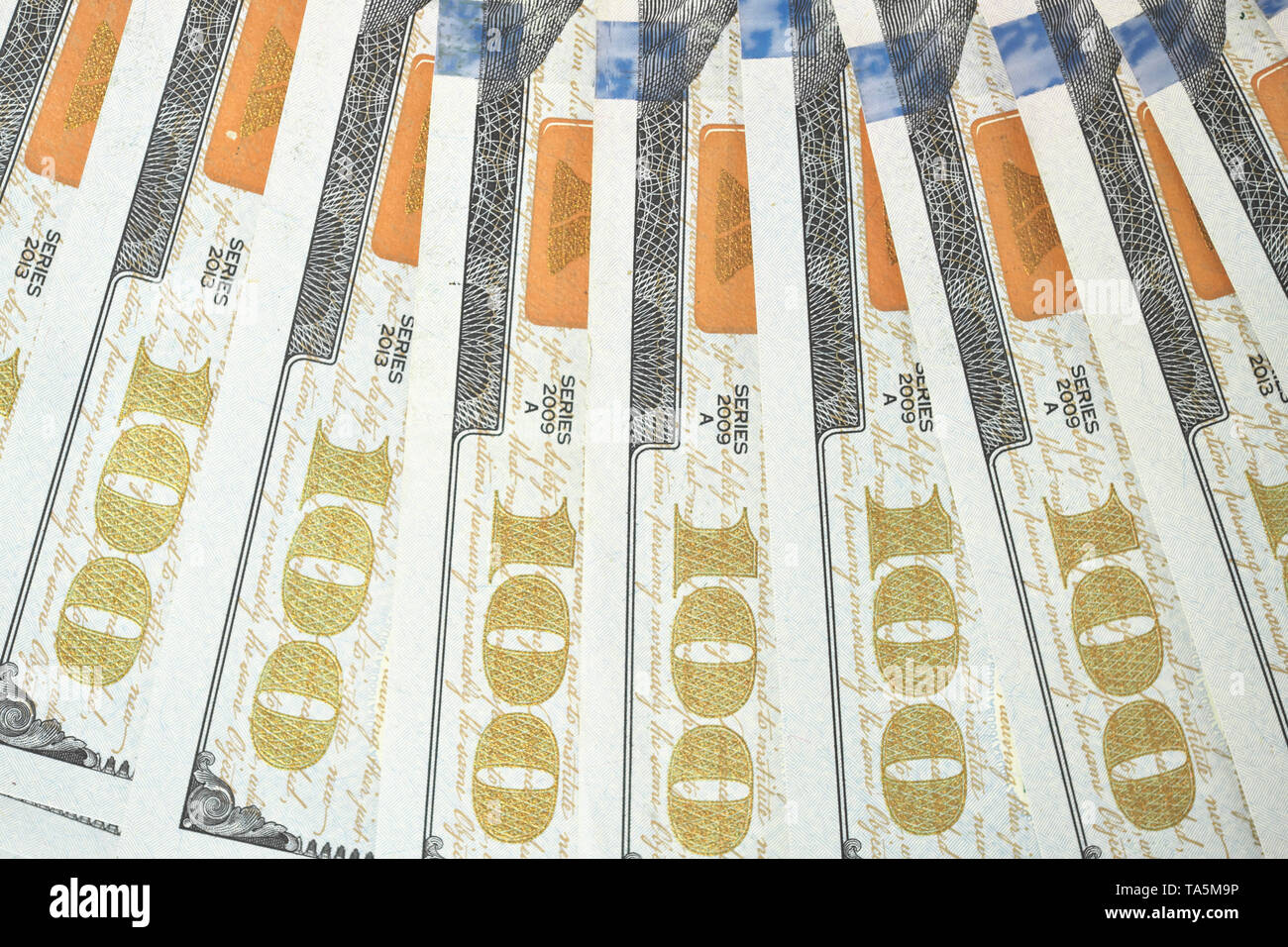 US paper banknotes in denominations of one hundred US dollars close-up ...