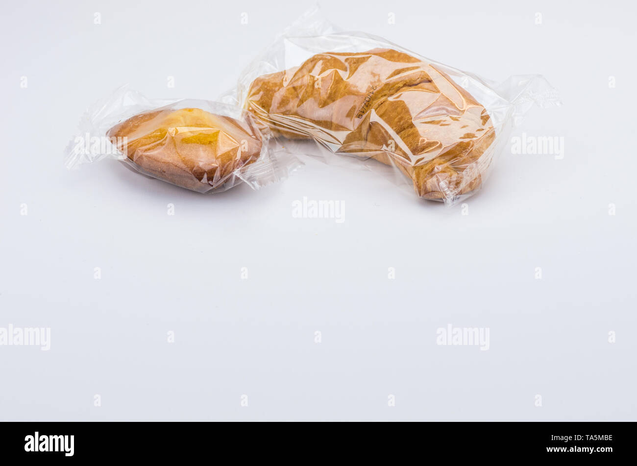 pre packaged snacks and pastries on a blank surface Stock Photo - Alamy