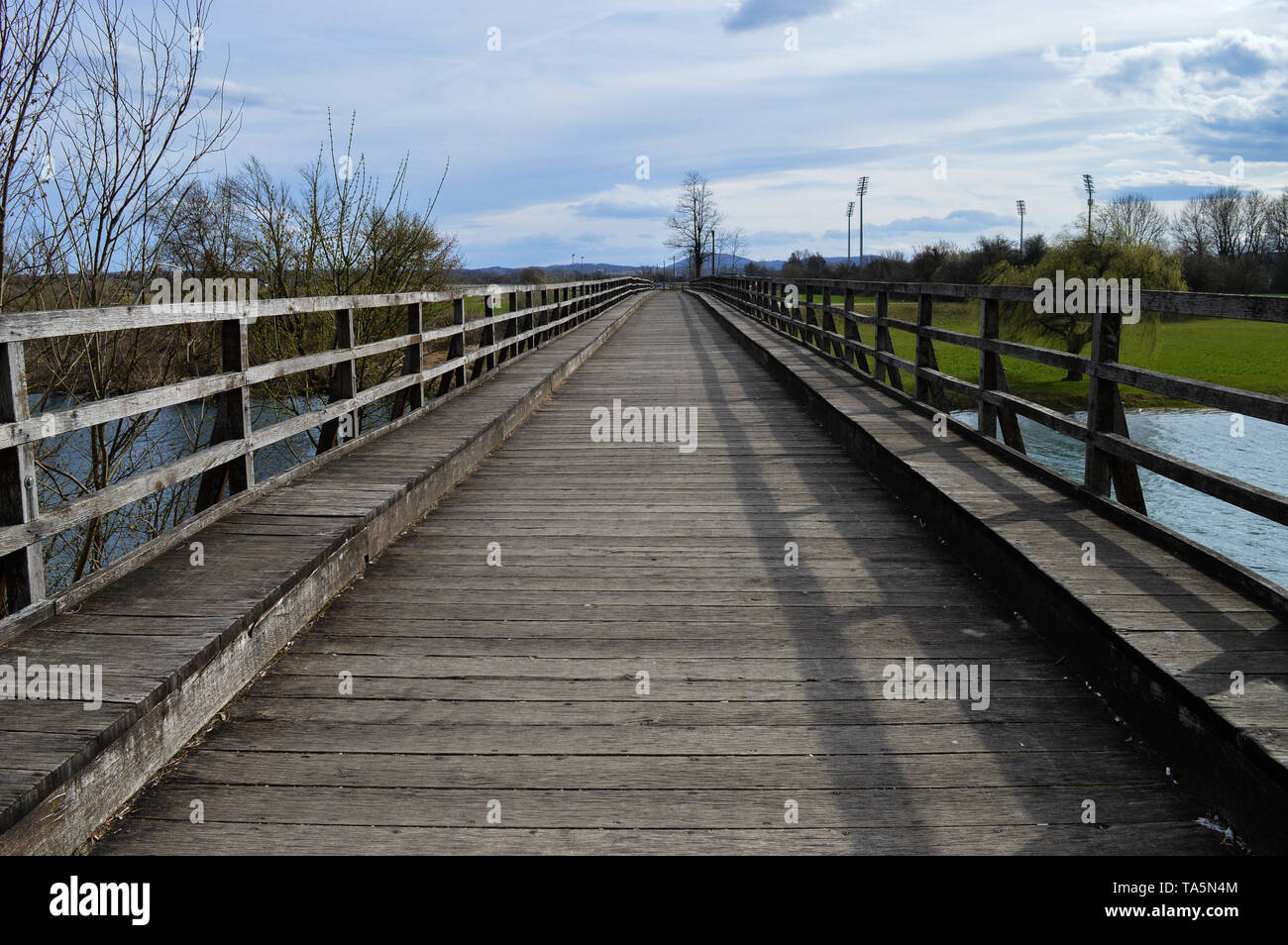 Wooden footbridge over river hi-res stock photography and images - Alamy