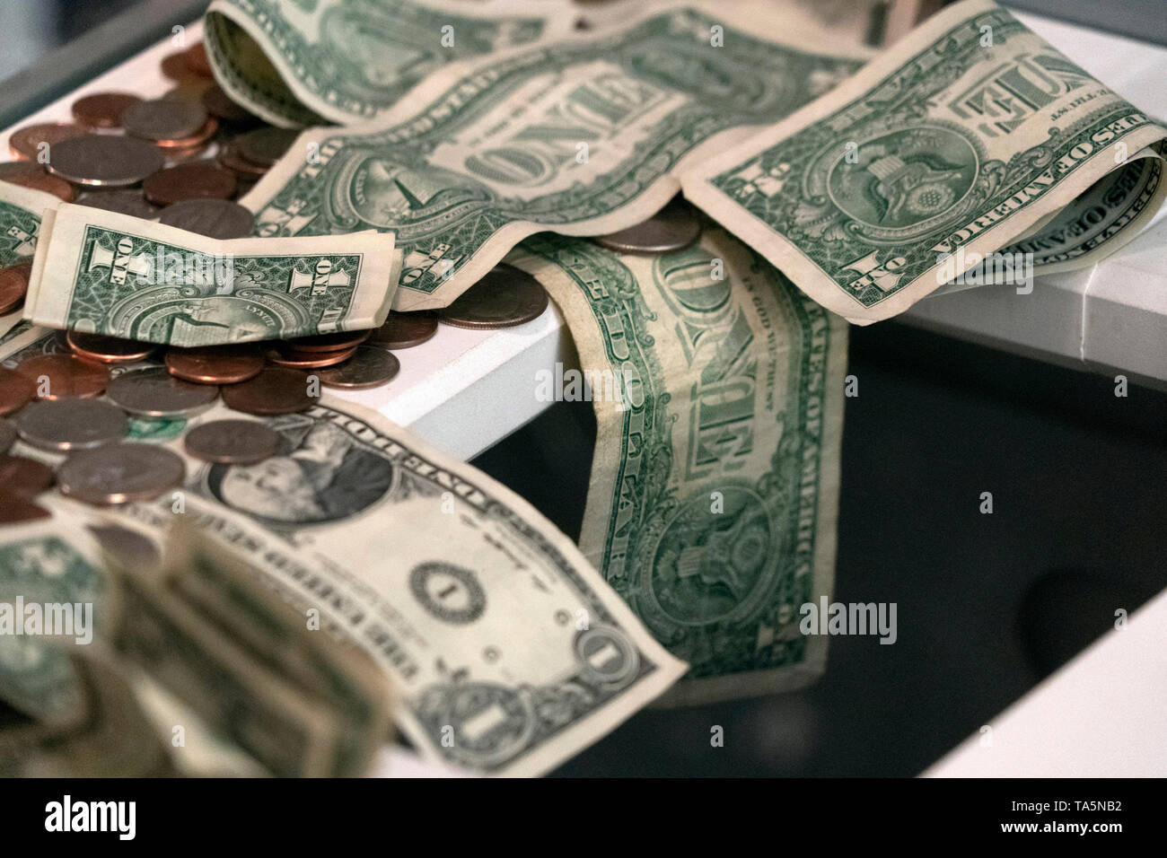 Usa dollars inside donation box detail Stock Photo - Alamy