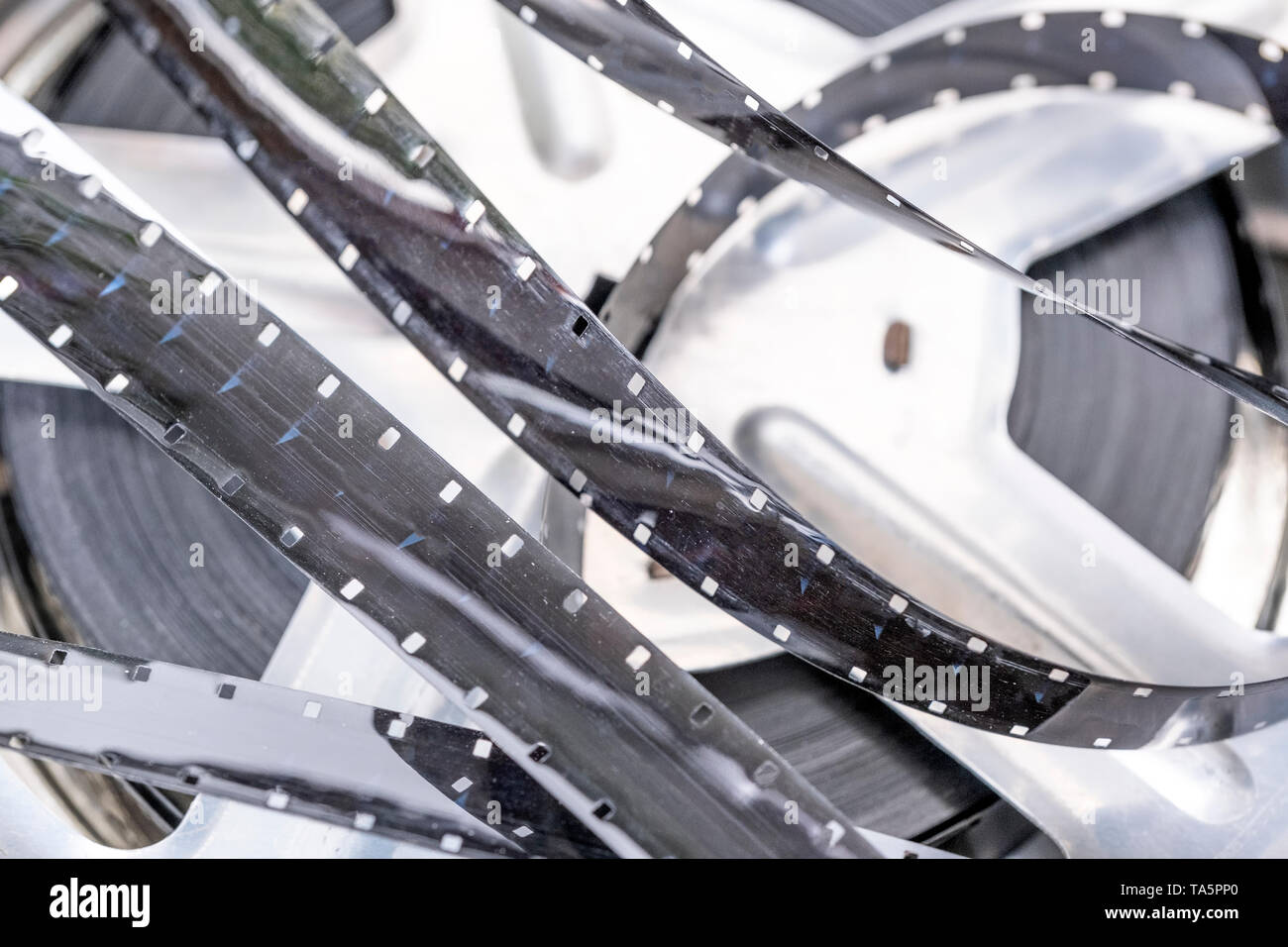 Metal reel with retro film strip sixteen millimeters close-up Stock ...