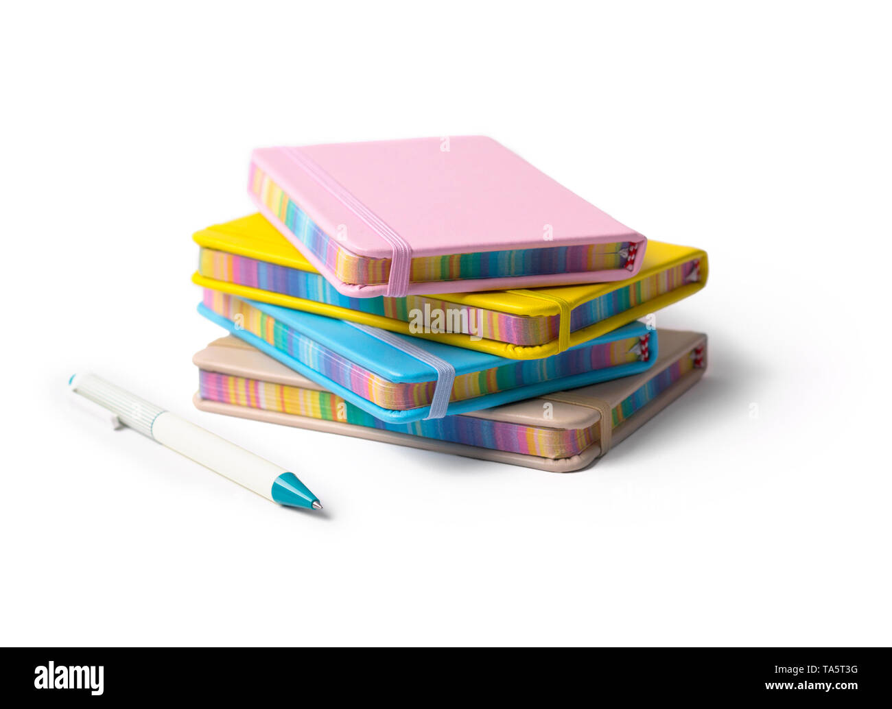 Colorful notebooks with pen isolated on white background. Back to ...