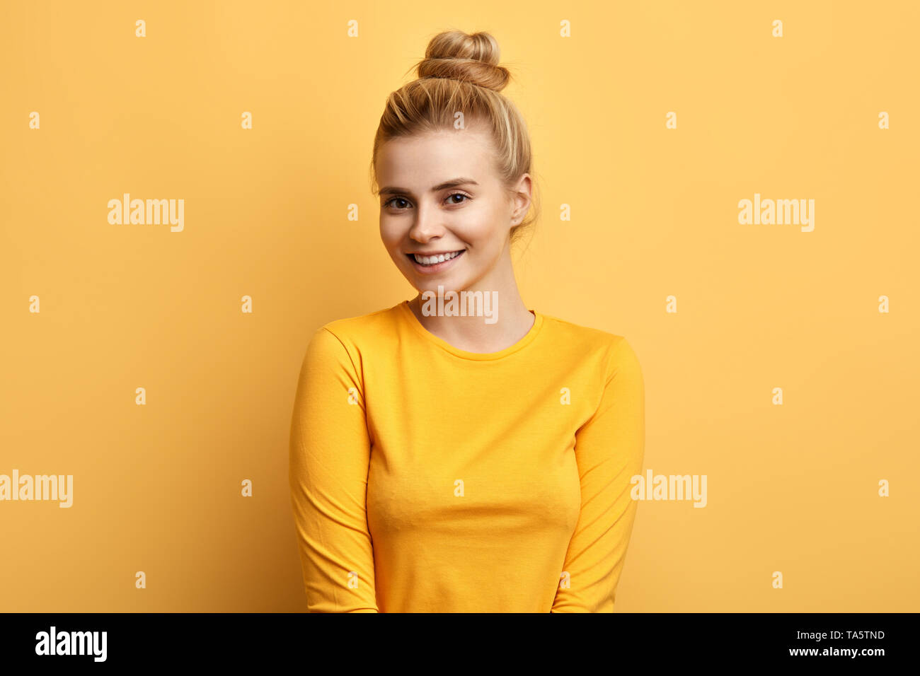 good looking awesome model looking at the camera. close up portrait ...
