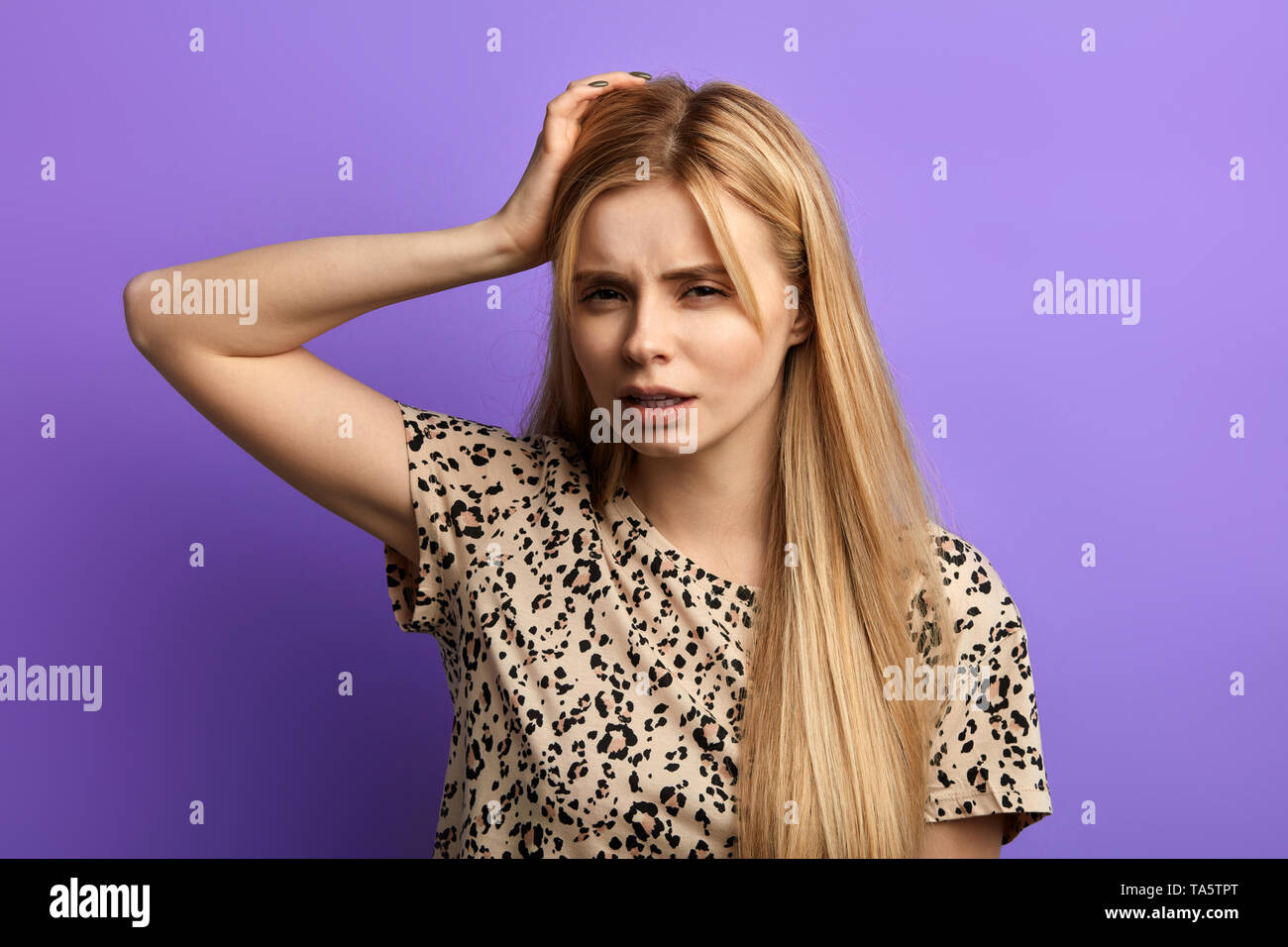 puzzled woman, scratching head, thinking, daydreaming, cannot remember ...