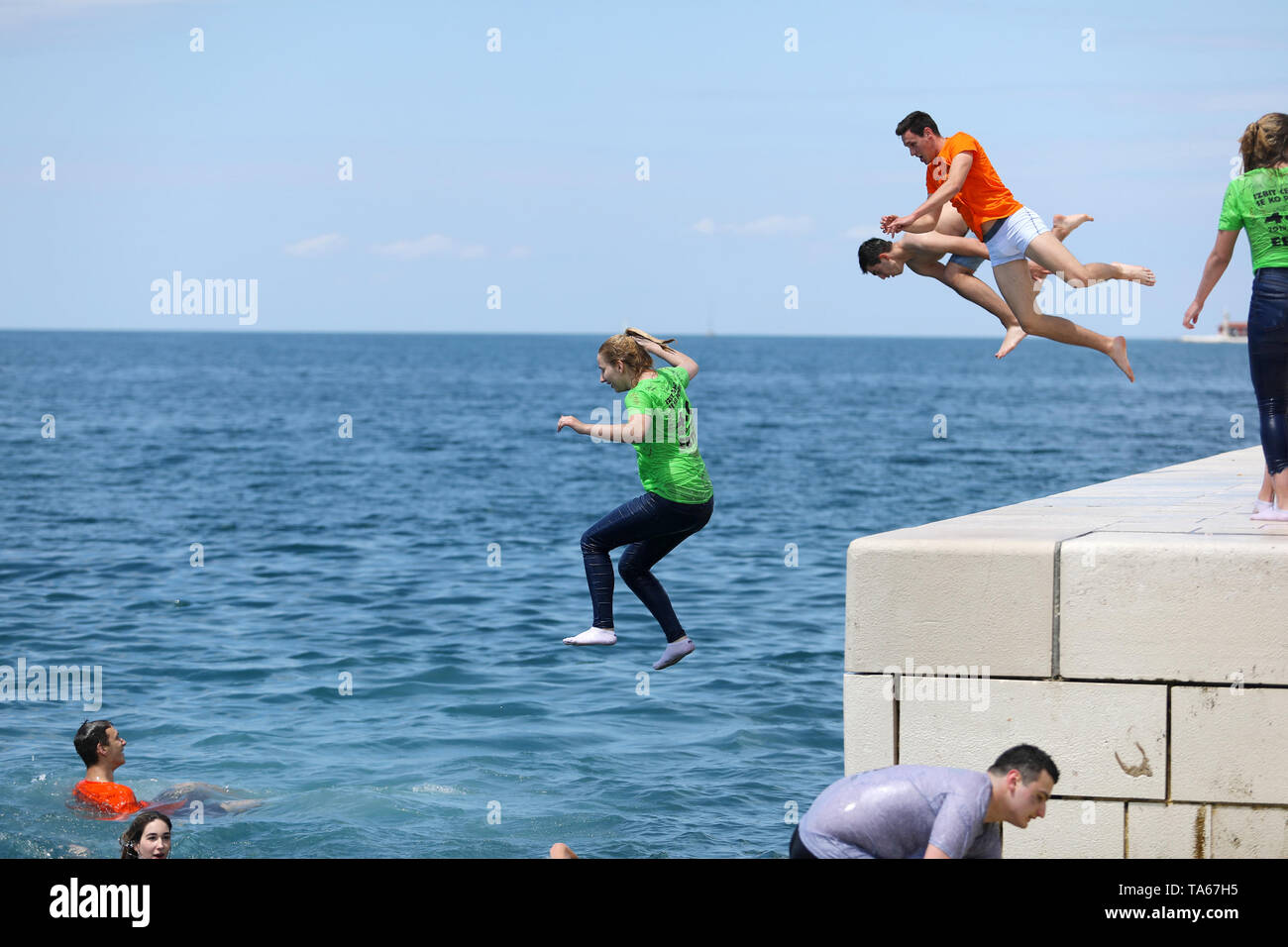Zagreb, Croatia. 22nd May, 2019. Secondary school students jump into ...