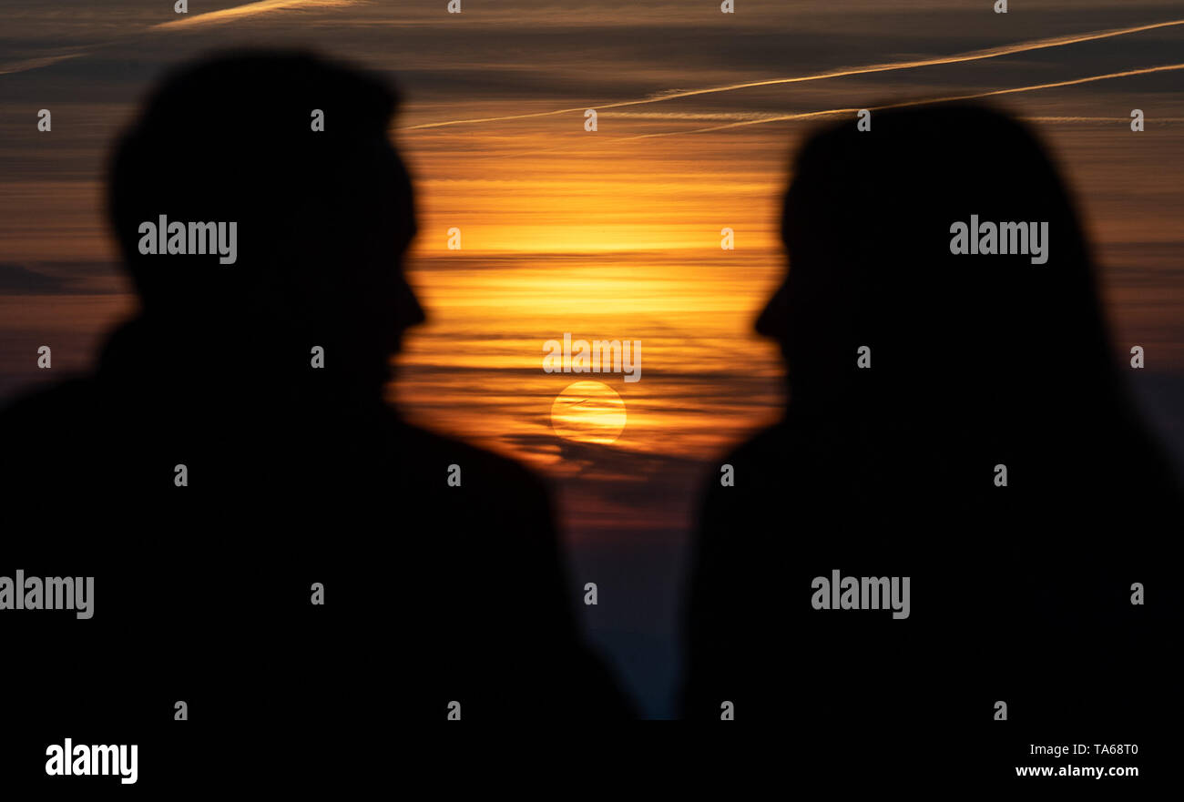 Watching each other hi-res stock photography and images - Alamy