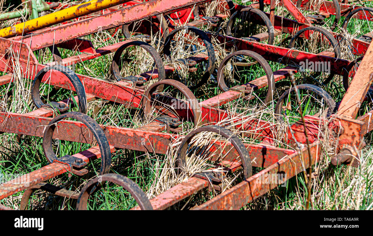 Close up of a spring tooth cultivator of an agricultural machinery old ...