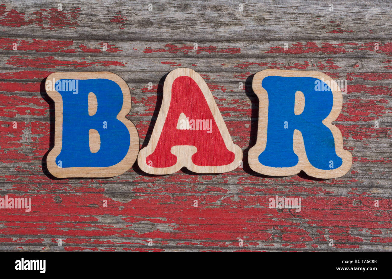 word bar made of wooden letters on shabby wood background Stock Photo ...