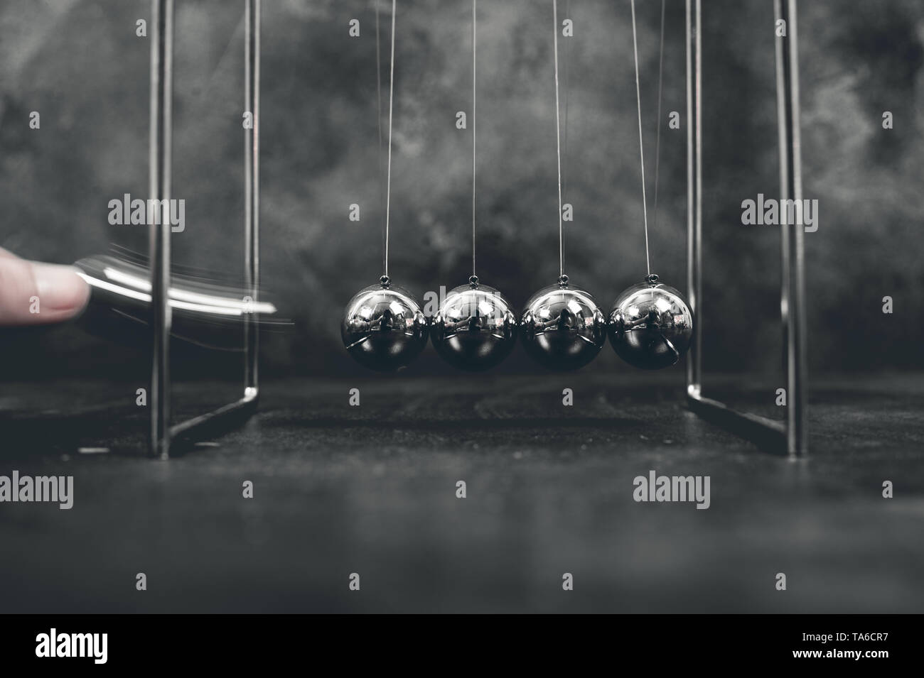 Swinging pendulums hi-res stock photography and images - Alamy