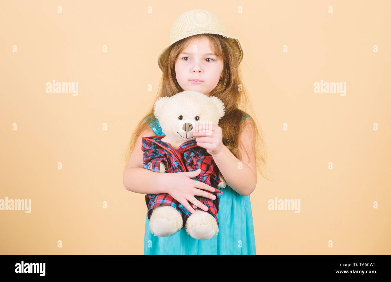 Its my toy. Small child cuddling teddy bear toy. Adorable girl child ...
