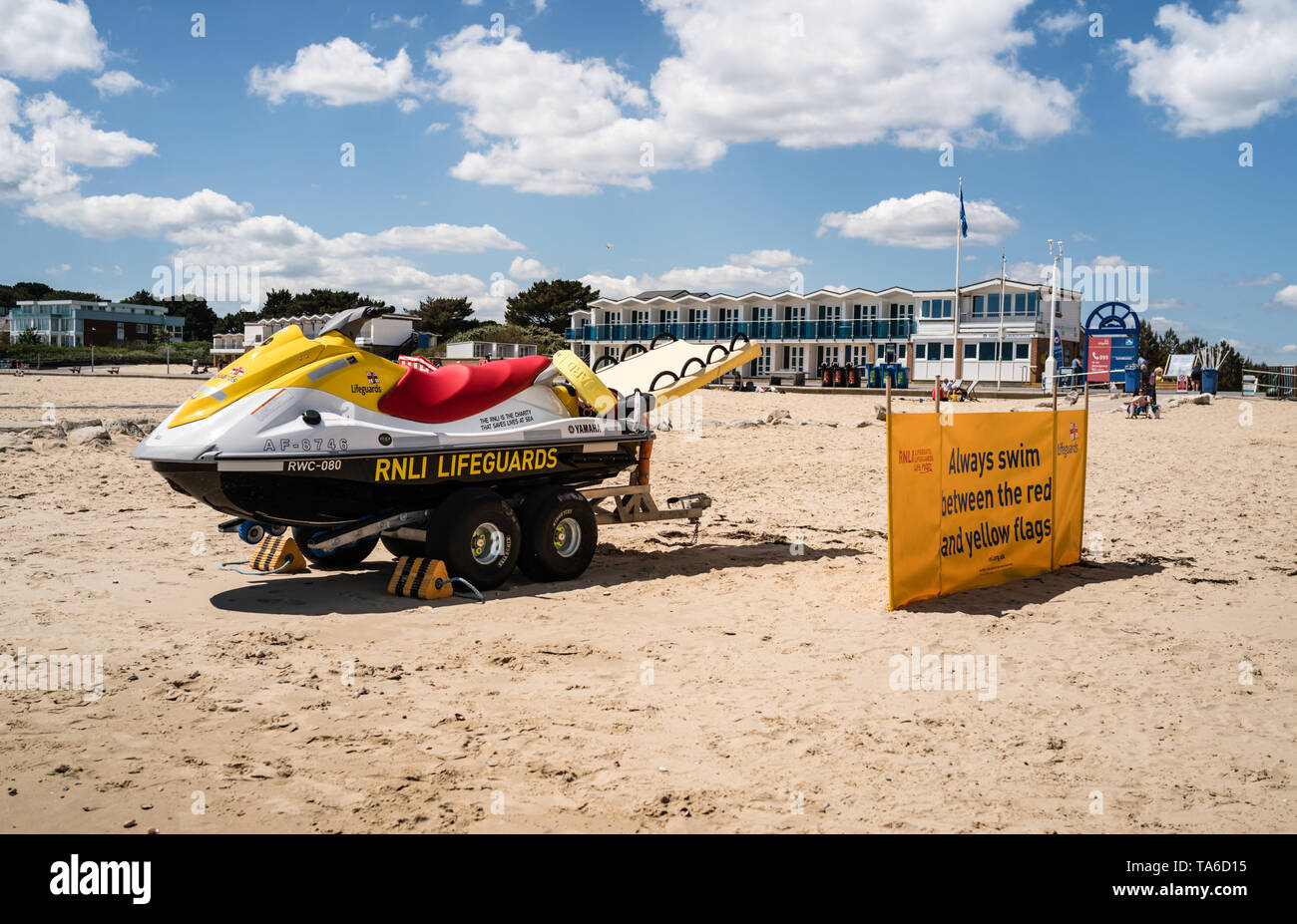 RNLI Lifeboat jet ski on trailer on the beach in Sandbanks Poole Stock ...