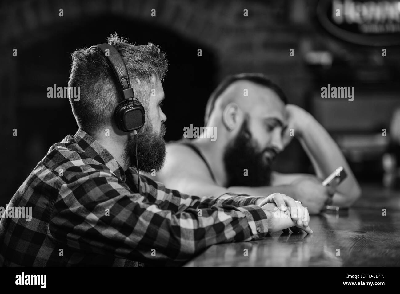 Escape reality. Friday relaxation in bar. Hipster bearded man spend ...