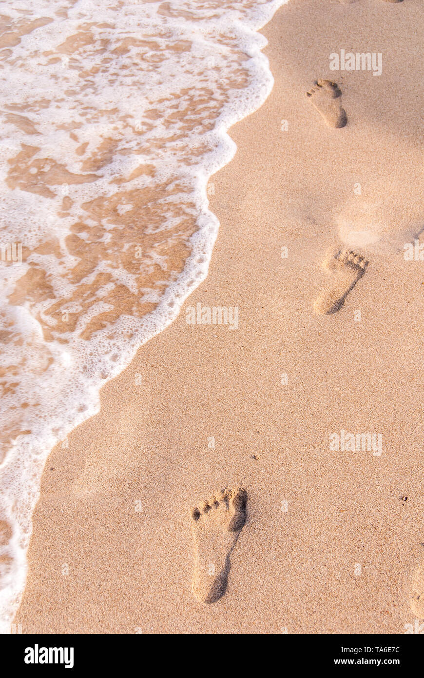 Splashing footprints hi-res stock photography and images - Alamy