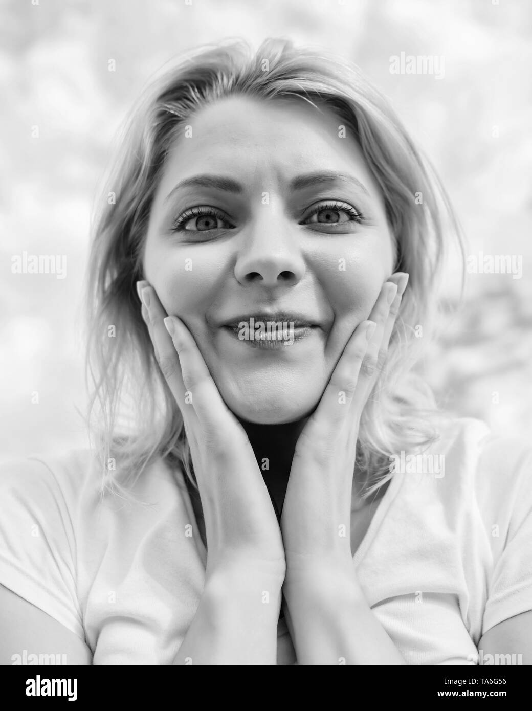 Beautiful surprised woman showing Black and White Stock Photos & Images ...