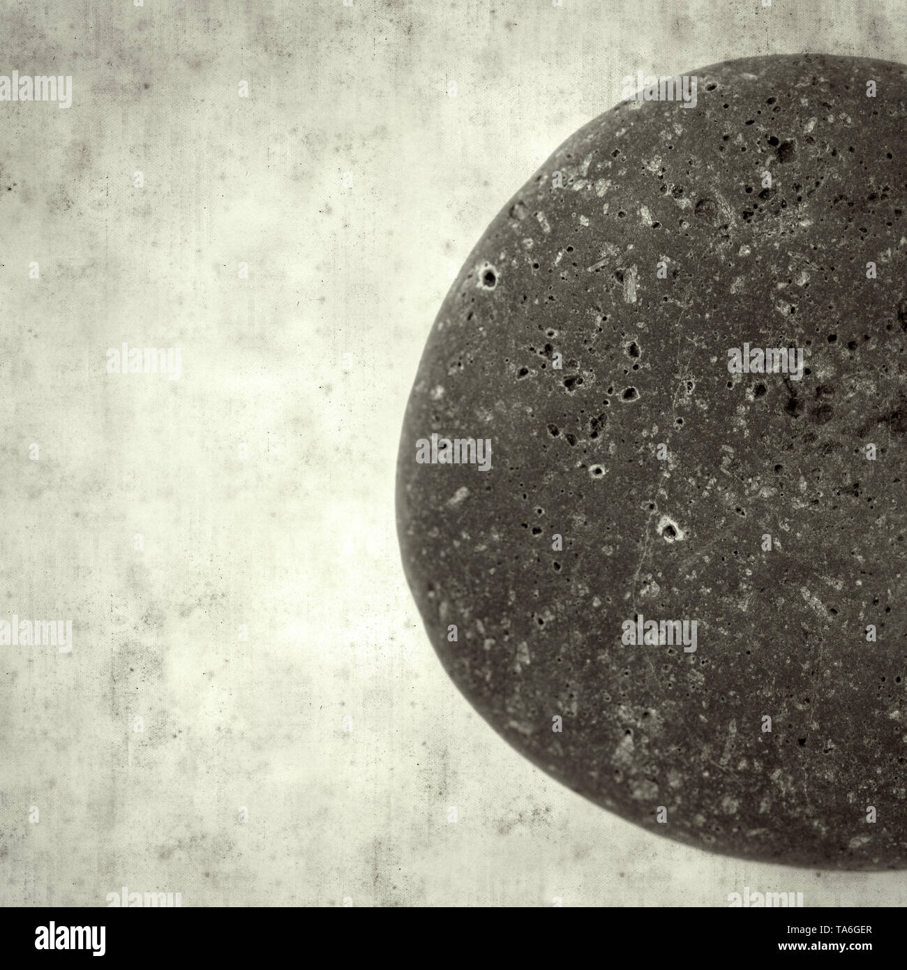 textured stylish old paper background, square, with dark lava rock ...