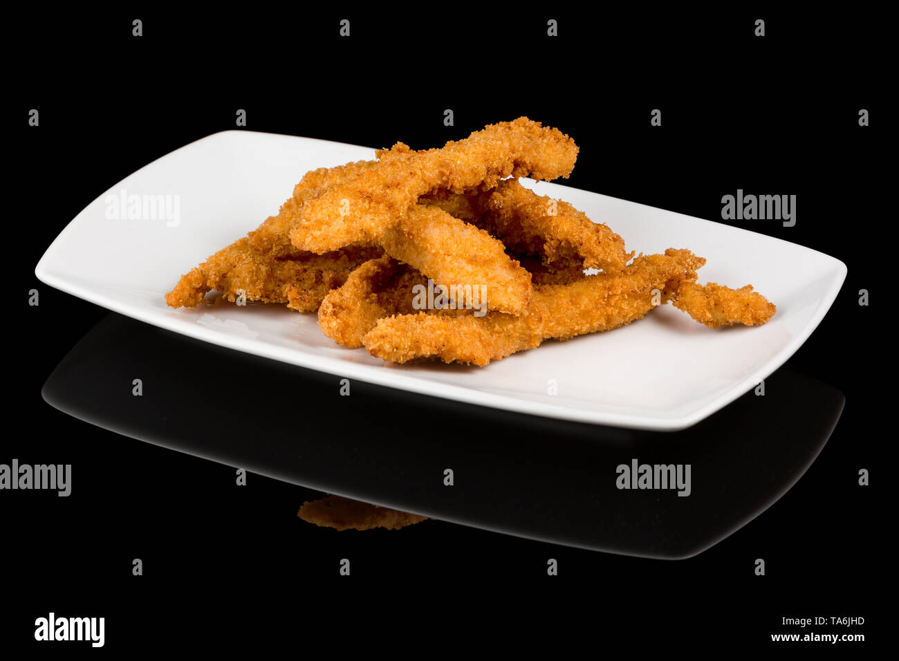 FISH STICKS isolated on black background with reflection. Studio shot ...