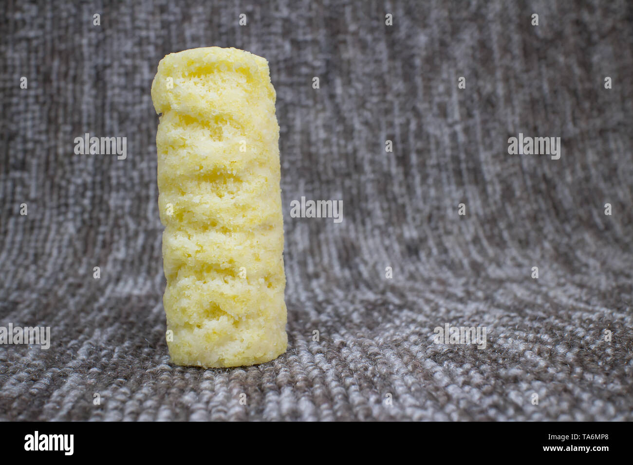 Roller corn snack, snack from corn product Stock Photo - Alamy
