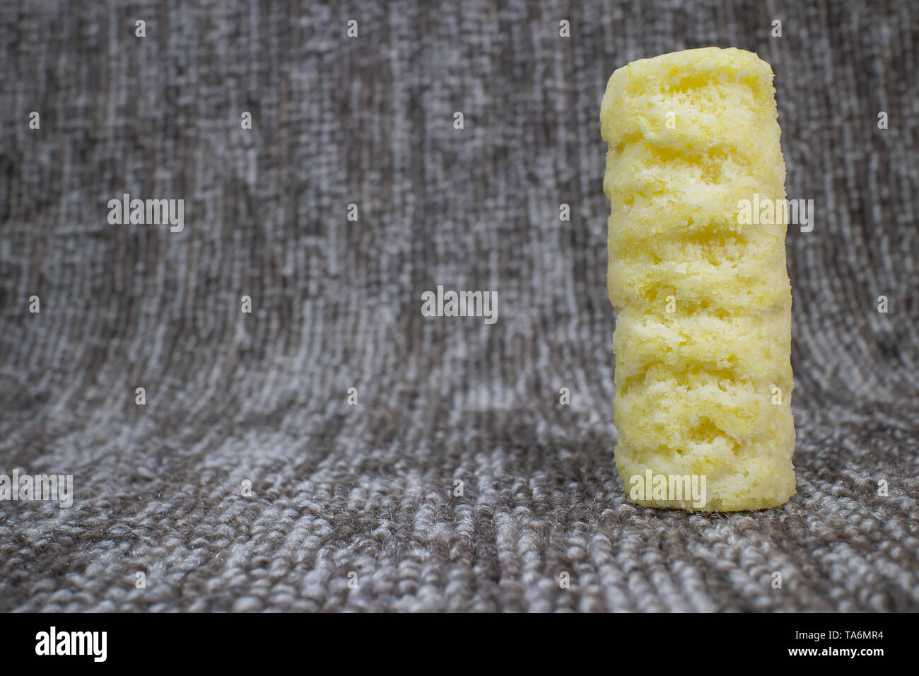 Roller corn snack, snack from corn product Stock Photo - Alamy