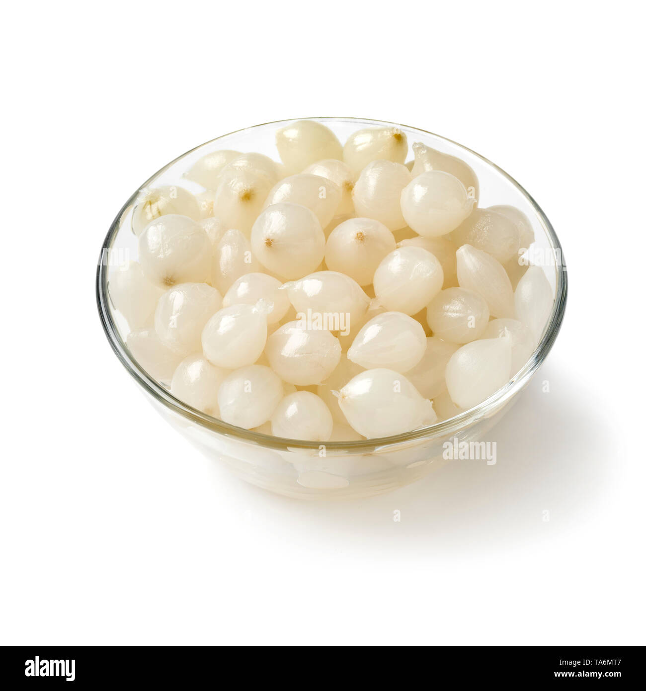 Glass bowl with traditional pickled silverskin onions isolated on white ...