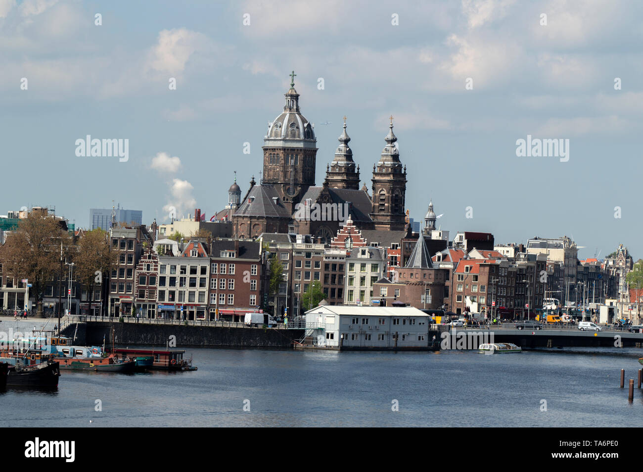 Oosterdok and basilica of saint nicholas hi-res stock photography and ...