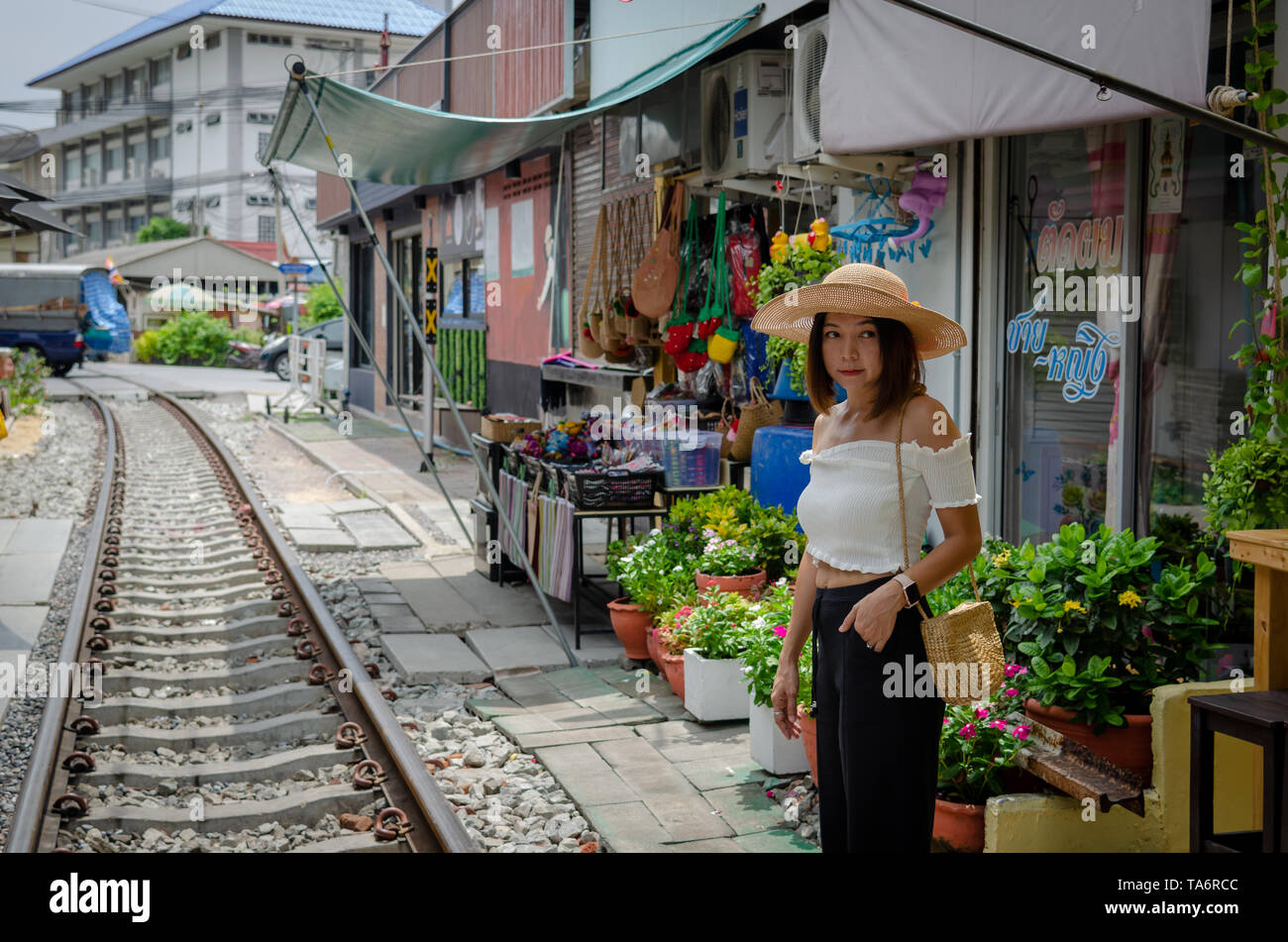 Beautiful girl on train tracks hi-res stock photography and images - Alamy