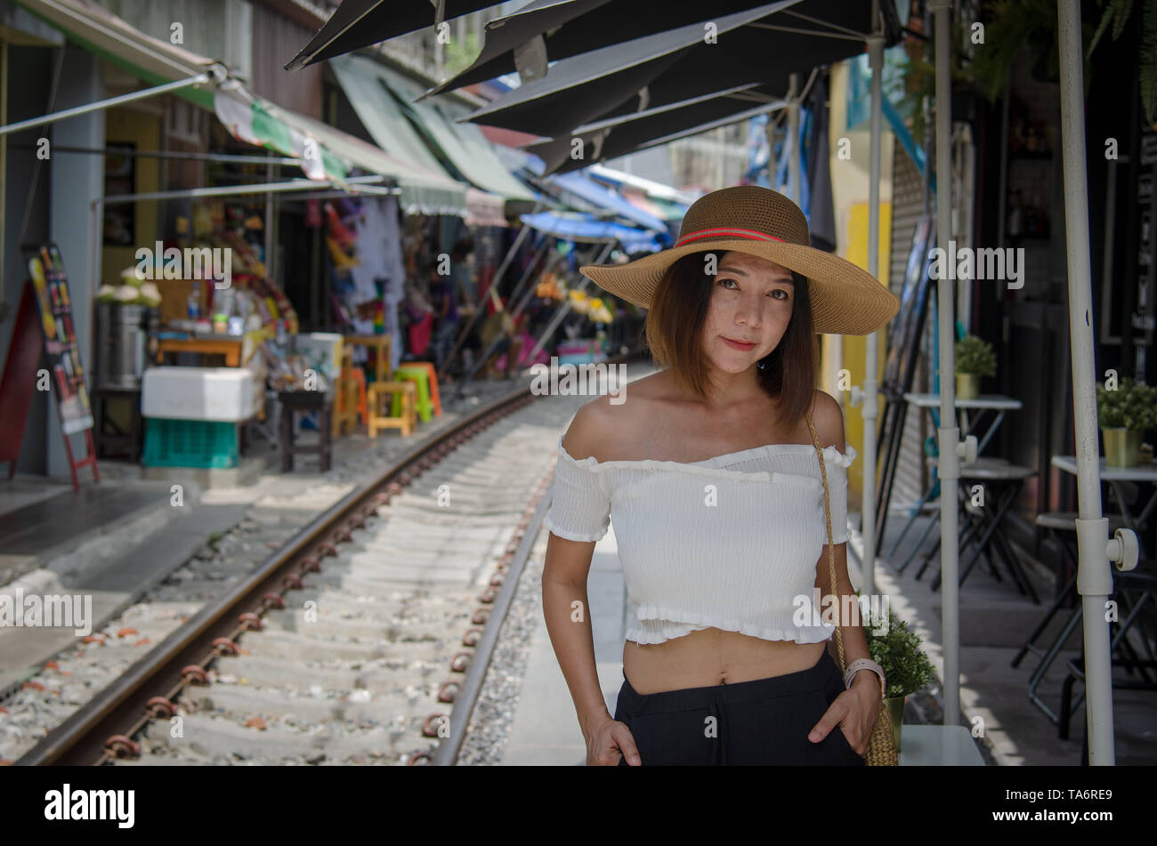 Beautiful girl on train tracks hi-res stock photography and images - Alamy