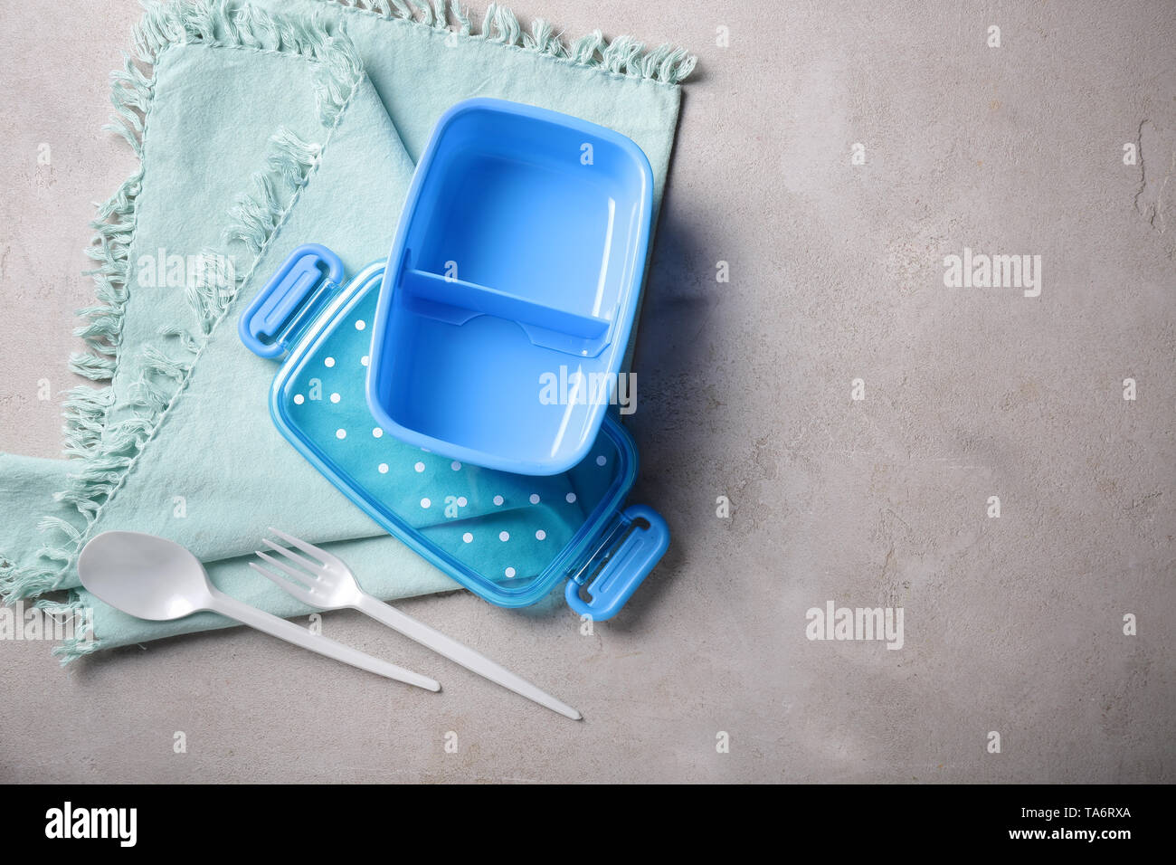 Empty school lunch box on grey background Stock Photo - Alamy