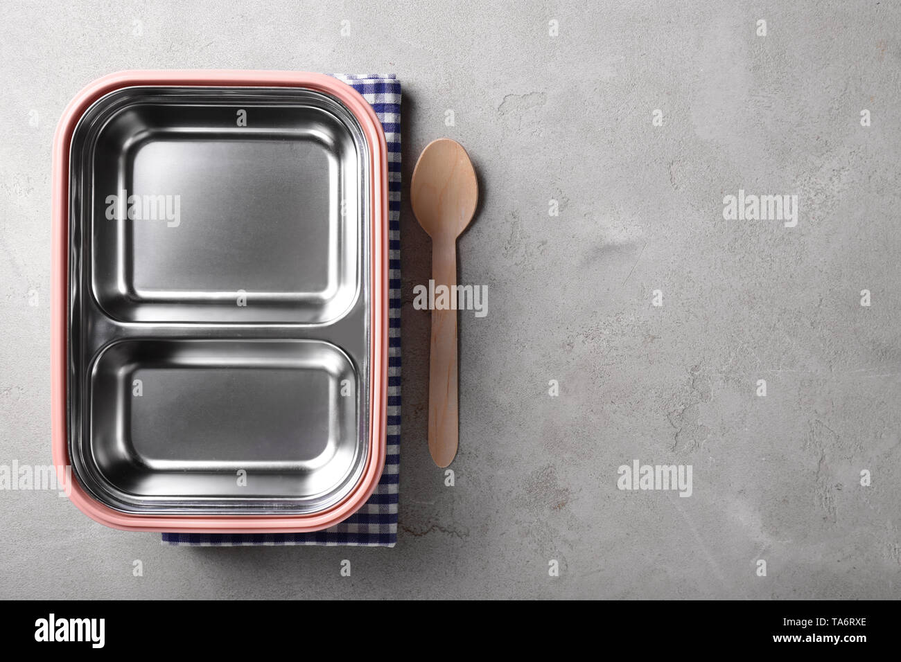 Empty school lunch box on grey background Stock Photo - Alamy