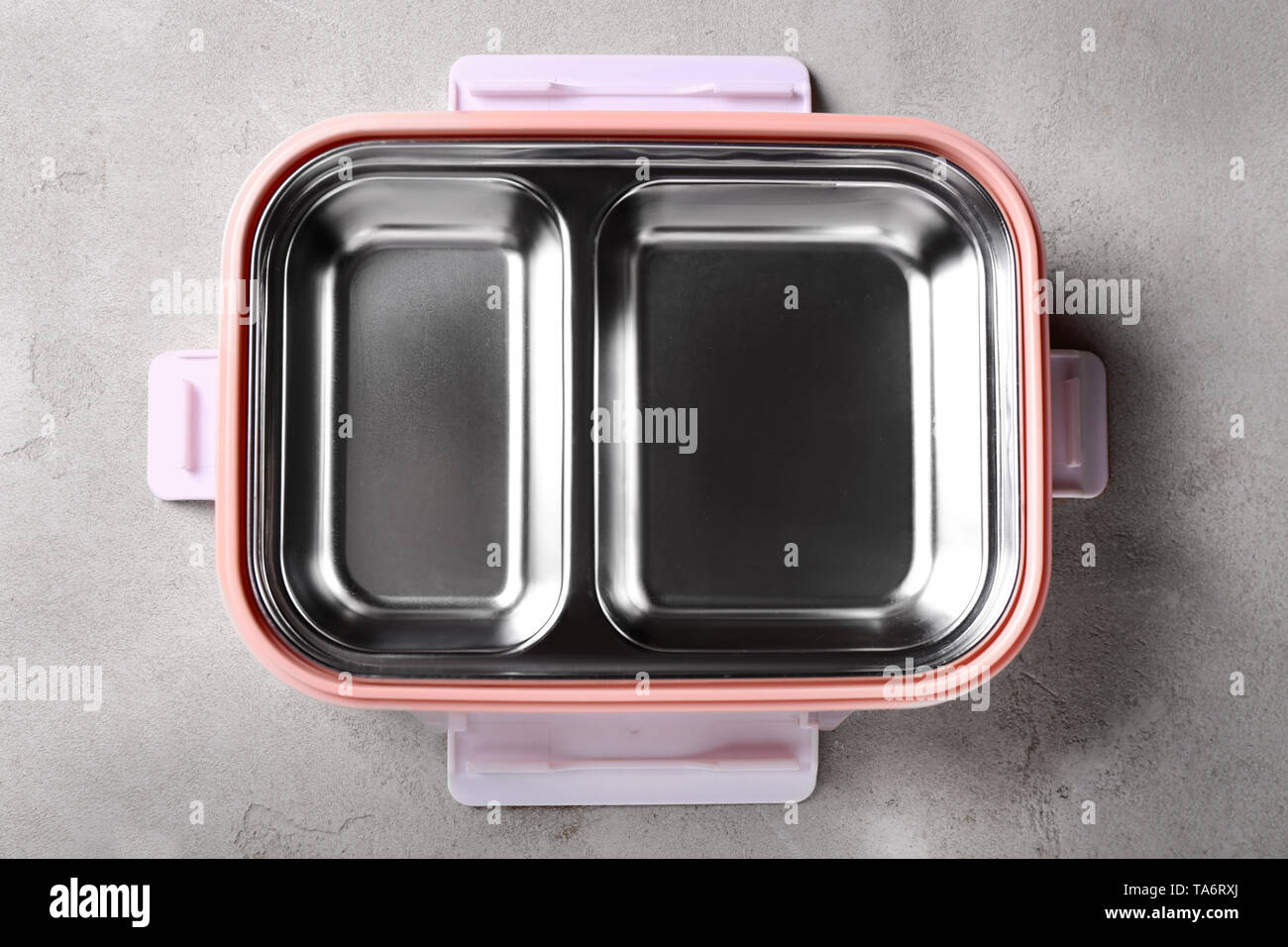 Empty school lunch box on grey background Stock Photo - Alamy