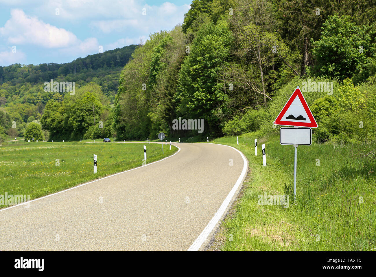Various road signs on the road warn of danger Stock Photo - Alamy